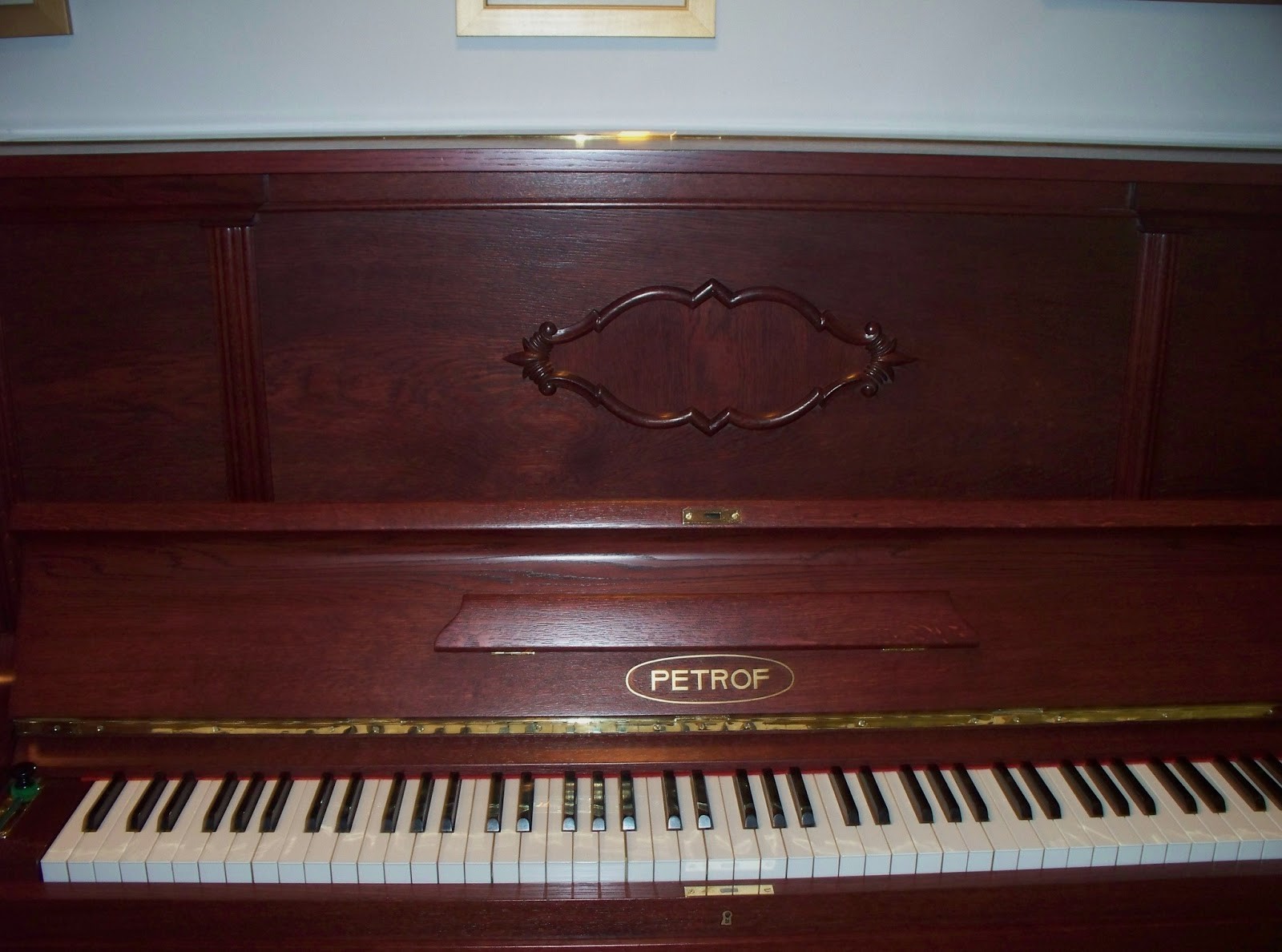 Petrof upright piano 54